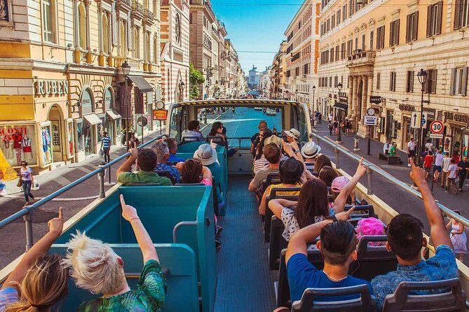 Rome Panoramic Bus Tour & Colosseum Arena Visit with Audio Guide - Key Points