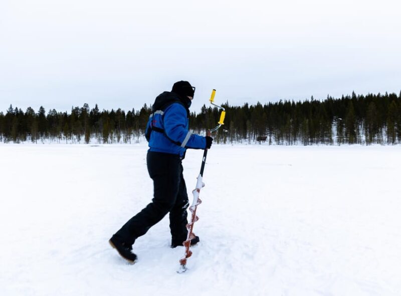 Saariselkä: Ice Fishing Safari by Snowmobile - An In-Depth Look at the Snowmobile & Ice Fishing Experience
