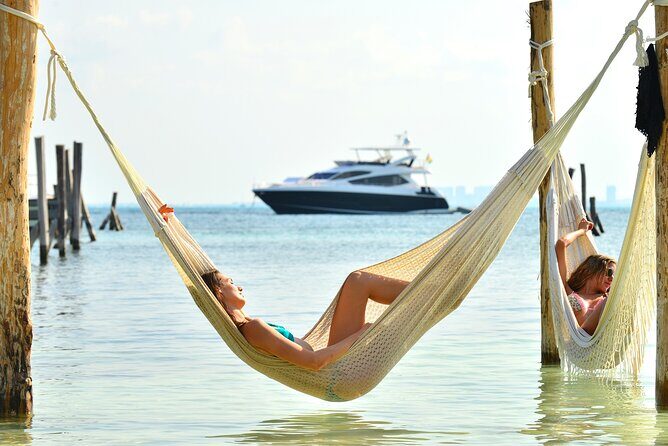 Sail Away Catamaran Day Trip with Snorkeling to Isla Mujeres - The Sum Up