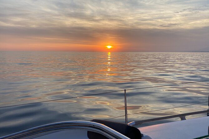 Sailing at sunset along the cliffs of Maro-Compartida - Discovering the Sunset Sailing Tour in Granada