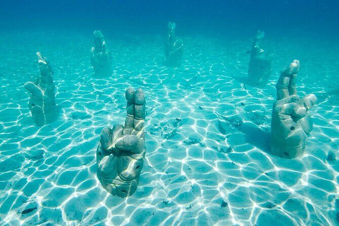 Sailing Catamaran to Isla Mujeres! Snorkel, Buffet & Open Bar - Frequently Asked Questions