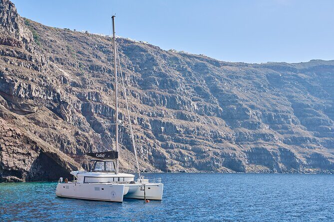 Santorini: Luxury Catamaran Cruise with Fresh Fish BBQ & Drinks - The Experience: What You Can Expect