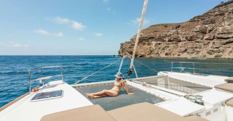 Santorini: Luxury Catamaran Day Trip with Meal and Open Bar - Key Points