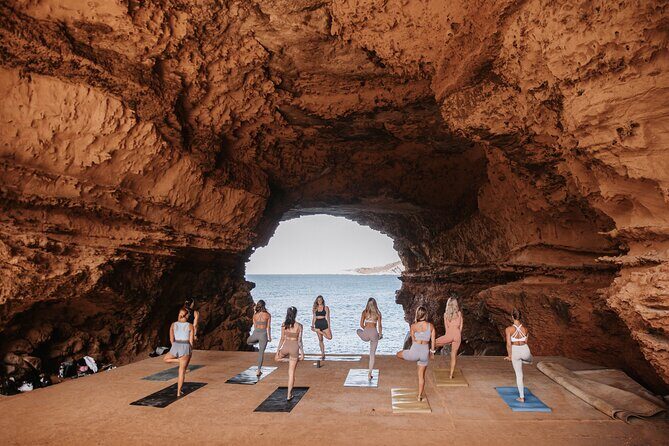 Secret Cove Yoga and Crystal Waters Experience in Ibiza - Discovering the Hidden Cove and Celebrating with Cava