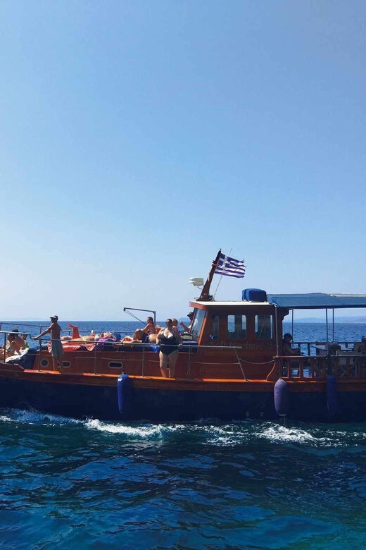 Skiathos: Traditional Boat Cruise with Swim Stops & Lunch - Setting Sail on a Traditional Wooden Vessel