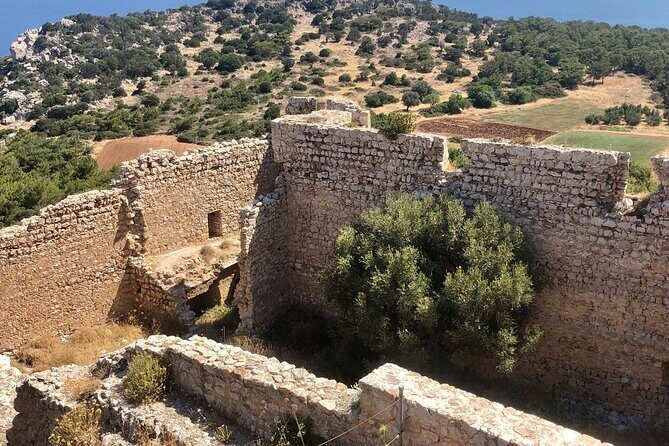 Small group hiking between the beach and Kritinia Castle - The Sum Up