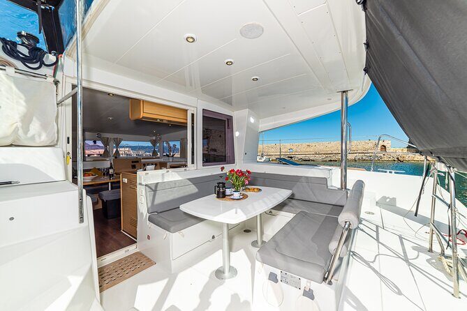 Small Group Santorini Catamaran Cruise with BBQ - The Sum Up