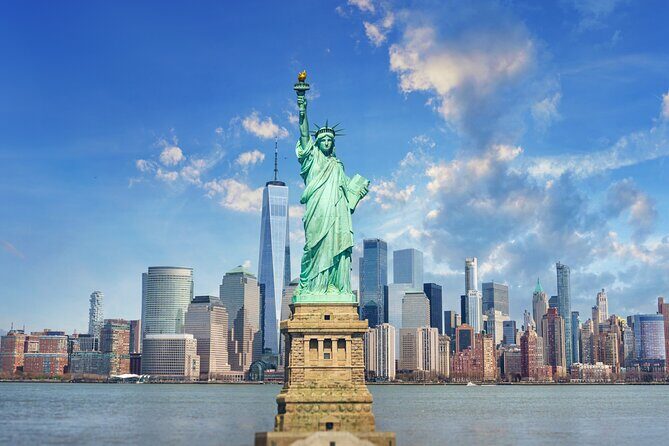 Statue of Liberty and Ellis Island Ferry with Audio Tour Access - Key Points
