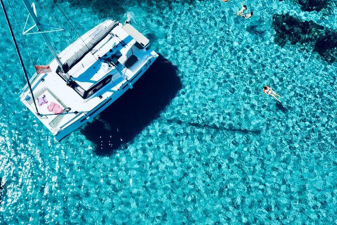 Stintino Half Day Catamaran Tour to La Pelosa with Aperitif - Key Points
