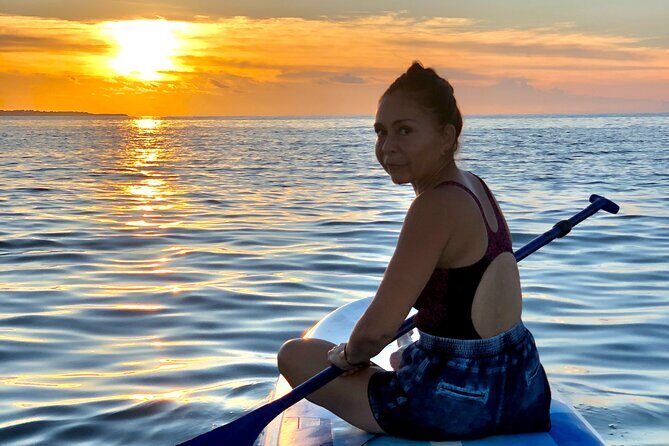 Sunrise Stand Up Paddle activity on a privileged beach. - Key Points