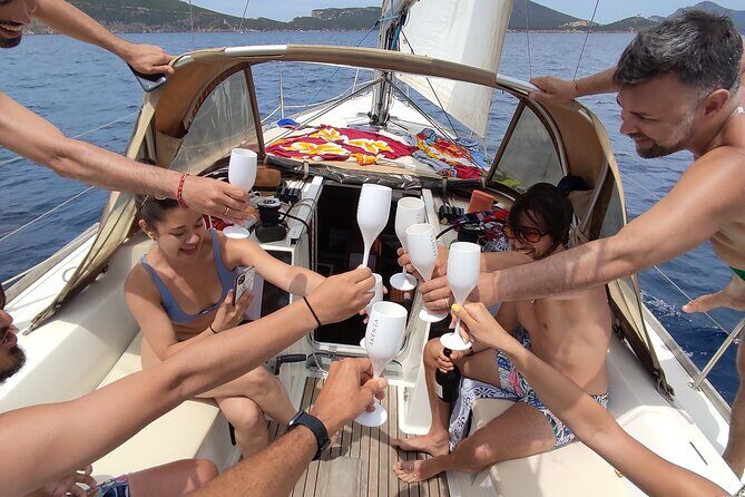 Sunset aperitif on a sailing boat in Alghero - Sunset aperitif on a sailing boat in Alghero: An Authentic Coastal Escape