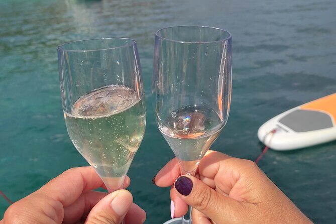 Sunset aperitif on a sailing boat in Alghero - FAQ