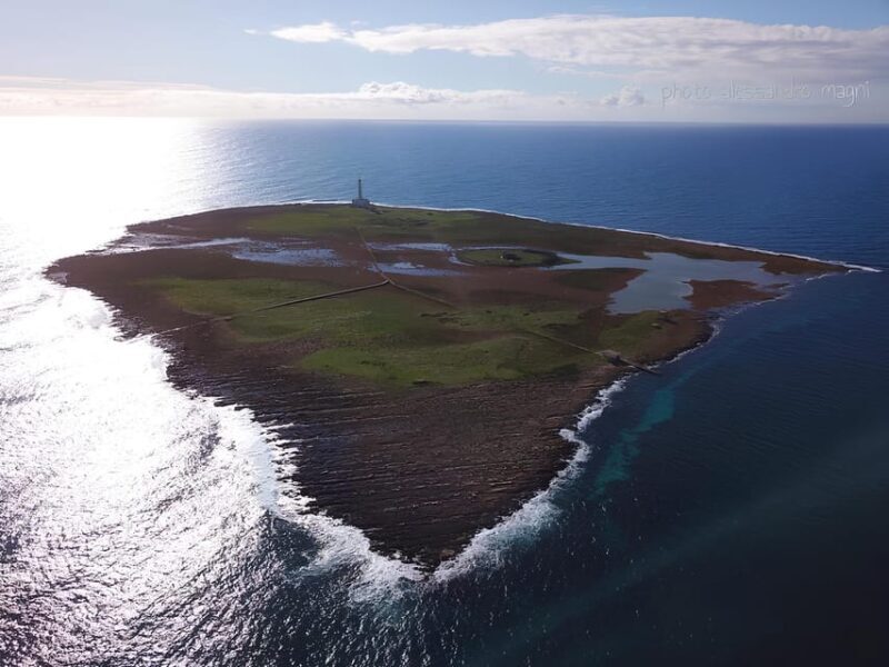 Sunset at the Island of S.Andrea Gallipoli - With aperitif - The Sum Up