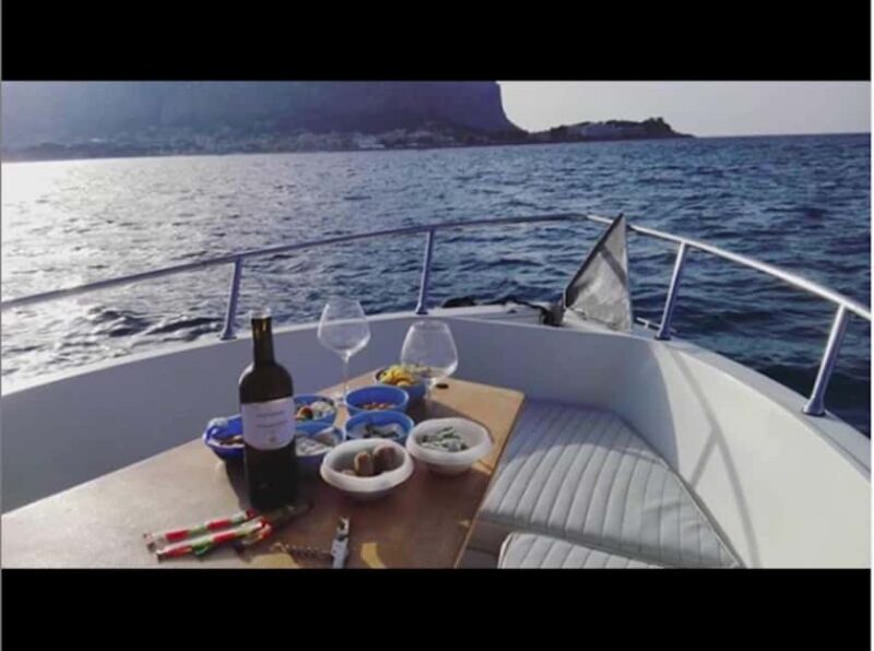 Sushi dinner on board at sunset at the Queen Cave - The Sum Up