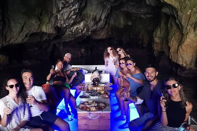 Syracuse Aperitif boat at Sunset island and sea caves - An Overview of the Experience