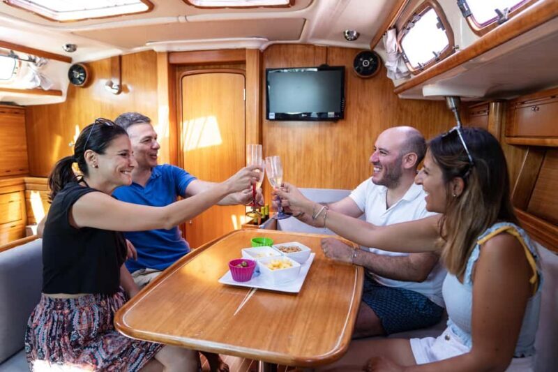 Taormina: Sailing boat tour with aperitif included - Key Points