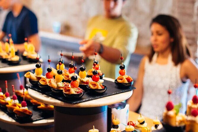 Tasty Tapas & Drinks Tour with a Rooftop Included - Key Points