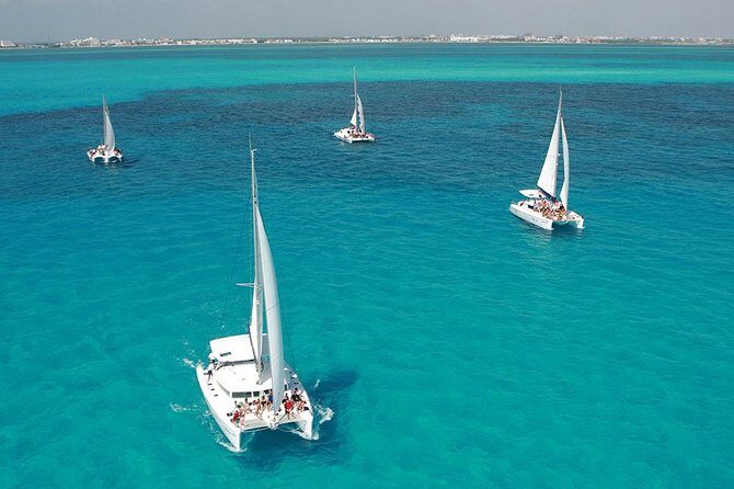 Top Tour Sail To Isla Mujeres By Catamaran Buffet And Drinks Included - The Vibe and Group Dynamics