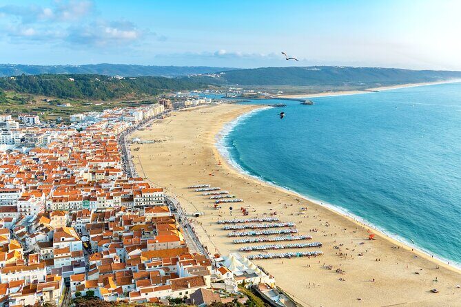 Transfer Tour Lisbon/Porto with 2 stops options Óbidos, Nazaré, Fátima, Coimbra - Exploring the Itinerary in Detail