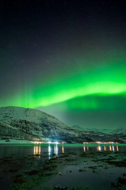 Tromsø: Northern Lights in a Minivan with Free Photos and a Hot Meal - Frequently Asked Questions