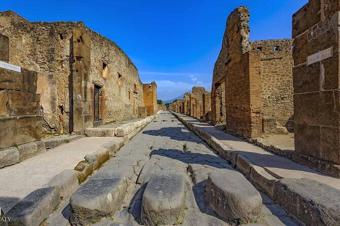 Visit Pompeii skip the line ticket with bus roundtrip - Key Points
