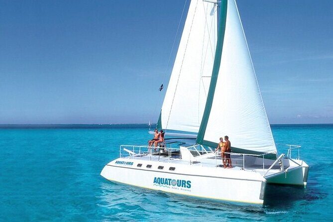 Wild adult catamaran party sailing to Isla Mujeres - Authentic Experiences and Hidden Details