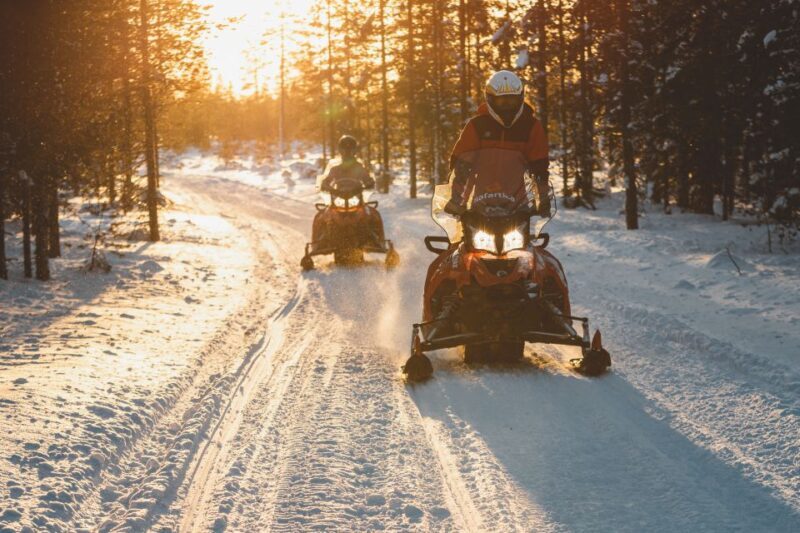Ylläs: Snowmobile Tour to Arctic Snow Village & Snack - The Journey to the Arctic Snow Village