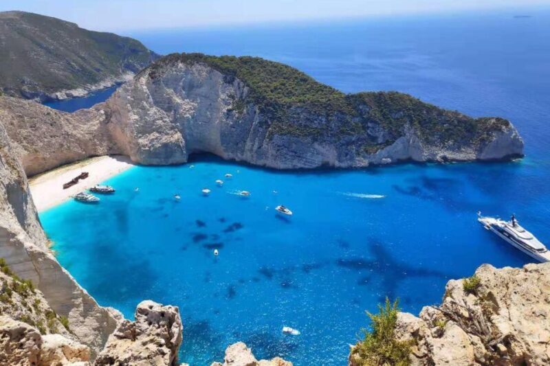 Zakynthos Small Group Tour Shipwreck & Blue Caves Land & Sea - Key Points